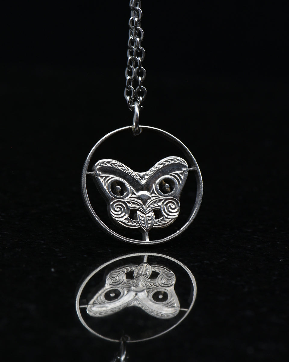 New Zealand - Maori Koruru Mask Cut Coin Pendant – R&R Legacy Studio